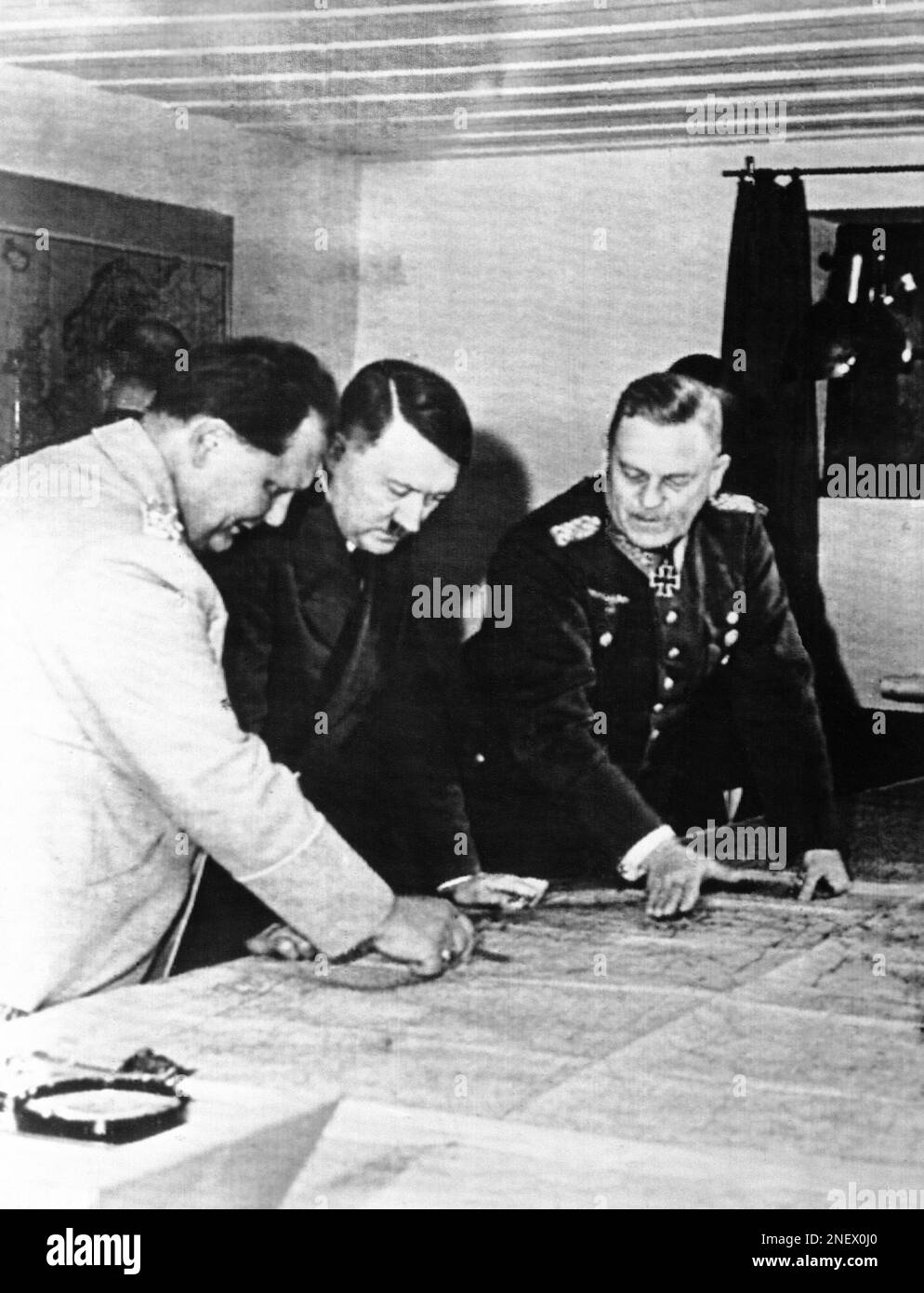 Adolf Hitler studies a war map with Reichs Marshal Hermann Goering at a ...