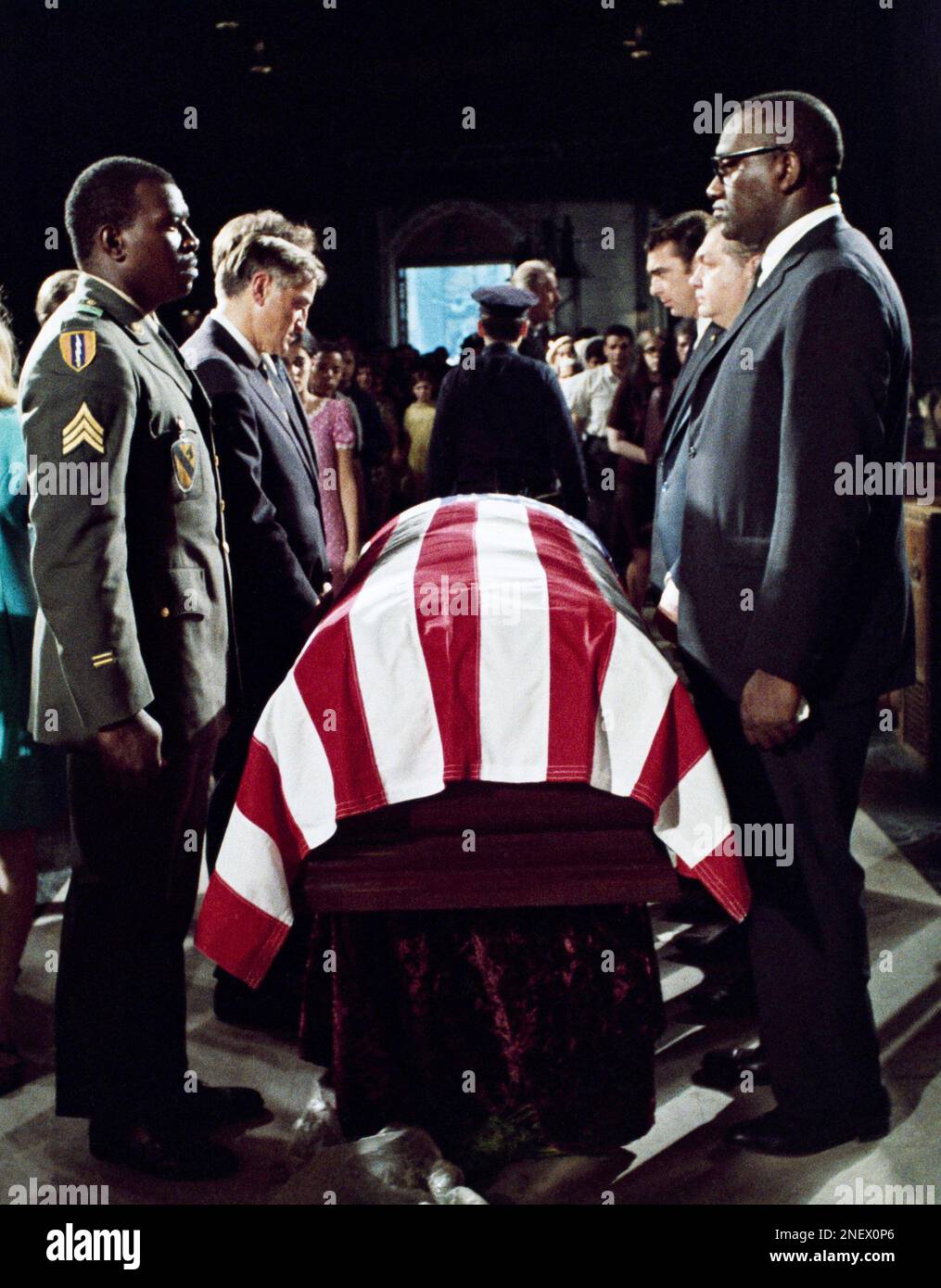 An honor guard stands over the casket of assassinated New York Senator ...