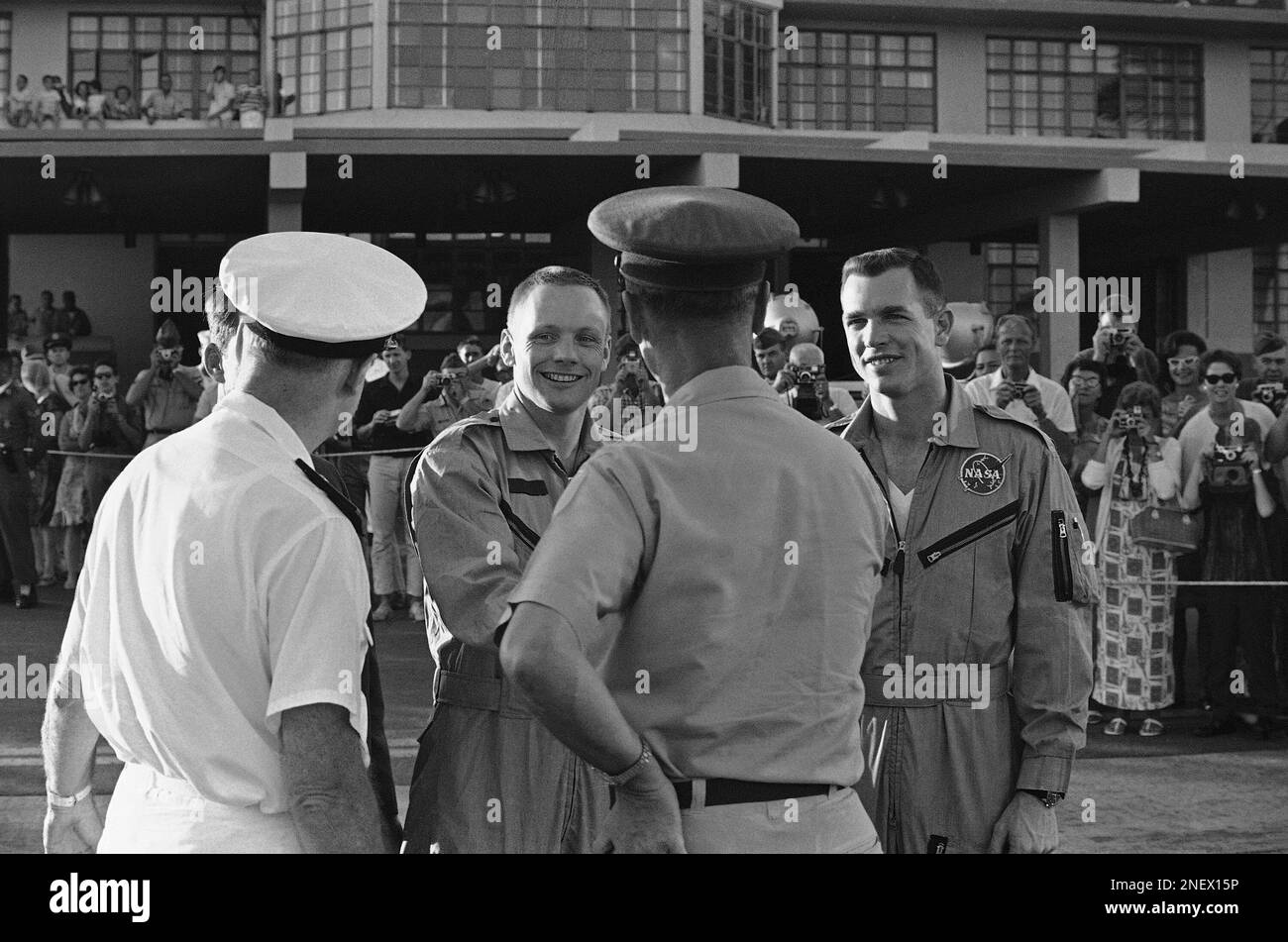 Astronauts Neil Armstrong, left, and David Scott say goodbye at Hickam ...