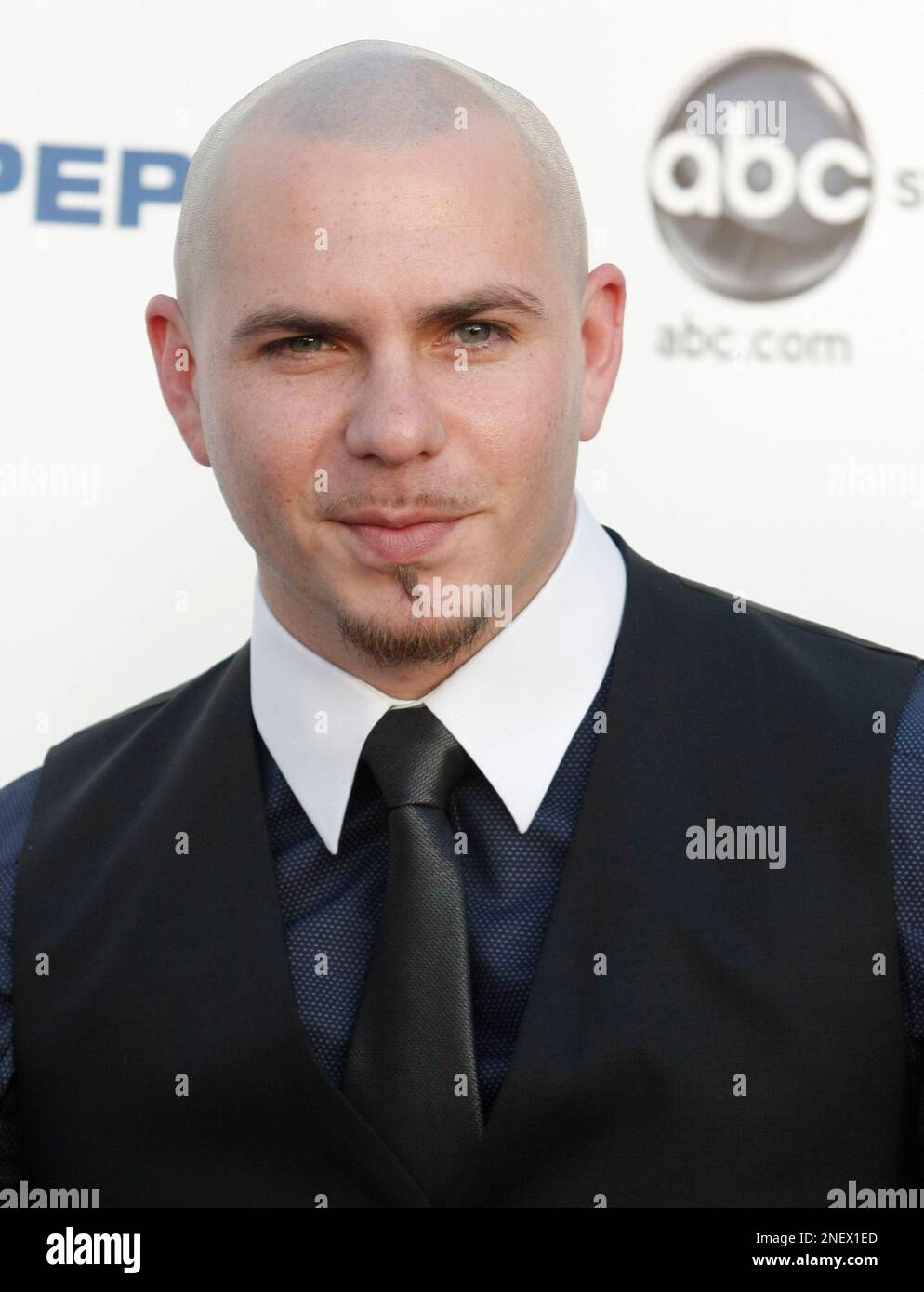 Rapper Pitbull arrives at the ALMA Awards in Los Angeles on Thursday ...