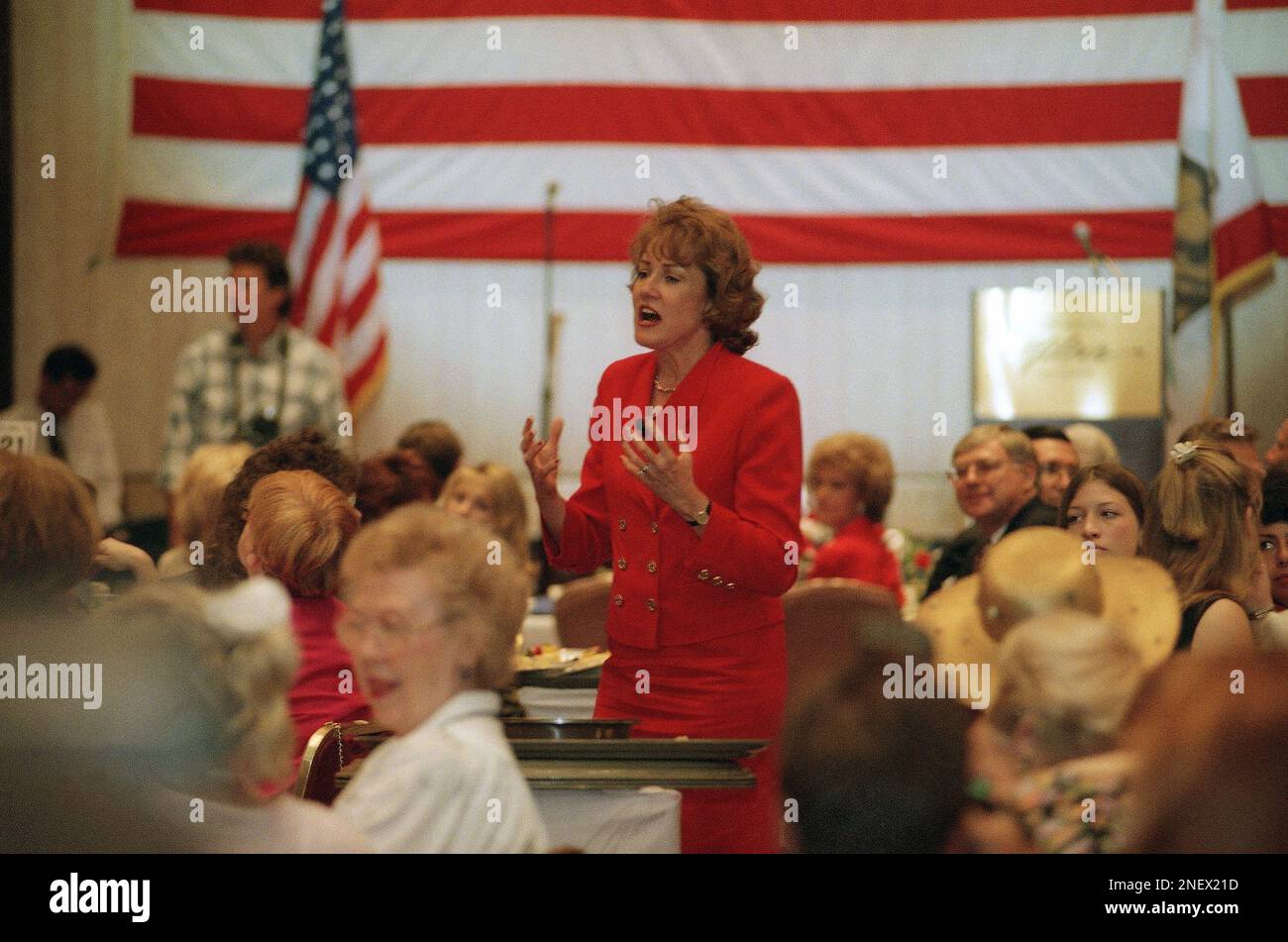 Wearing a wireless microphone, Elizabeth Dole, wife of Republican ...