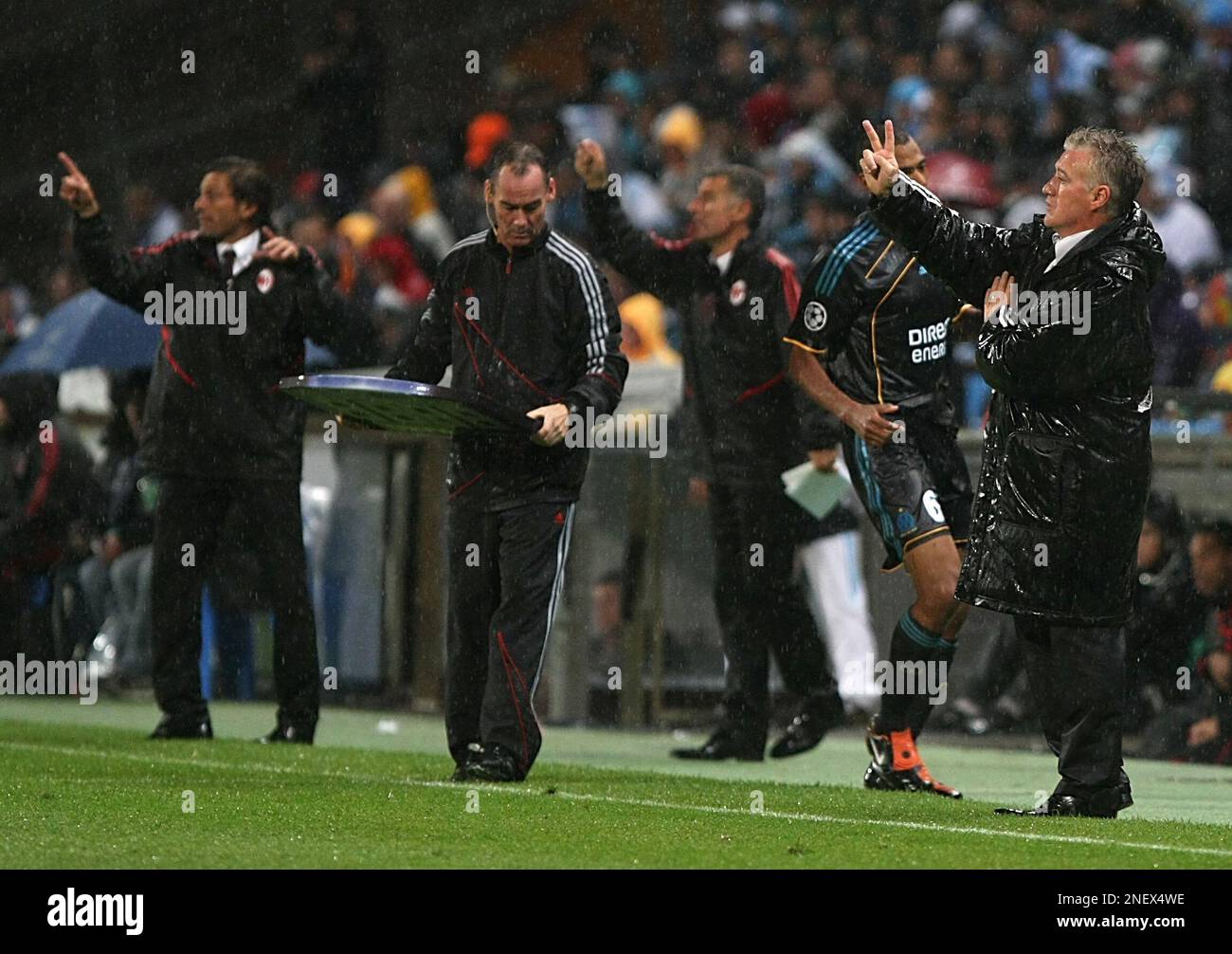 Marseille's coach Didier Deschamps, right, and AC Milan's coach ...