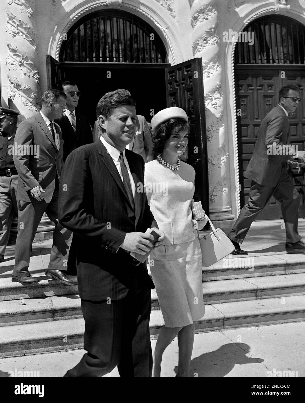President John F. Kennedy and first lady Jacqueline Kennedy, each ...