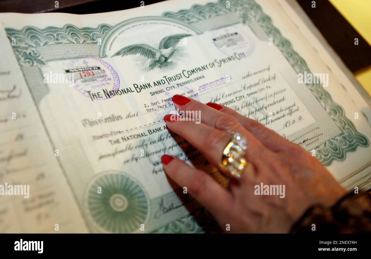 This photo taken July 10, 2009 shows Cathy Calhoun looking over an old ...