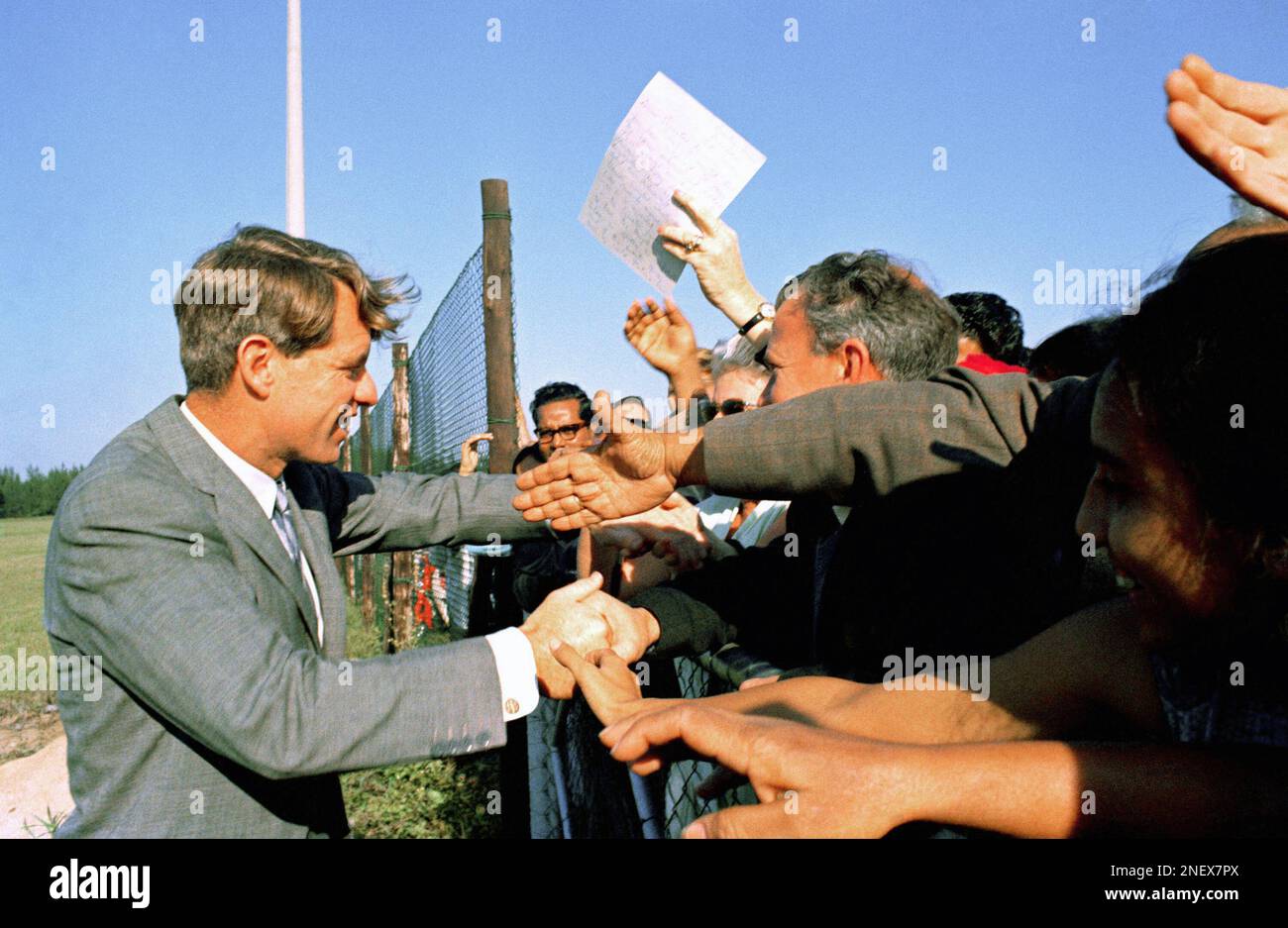 Sen. Robert F. Kennedy is shown being greeted in southern Tanzania ...