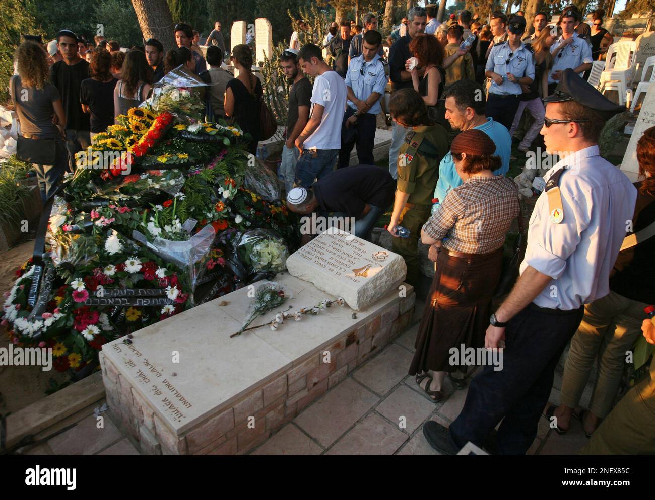 Friends and relatives of Capt. Assaf Ramon, killed in an air crash ...