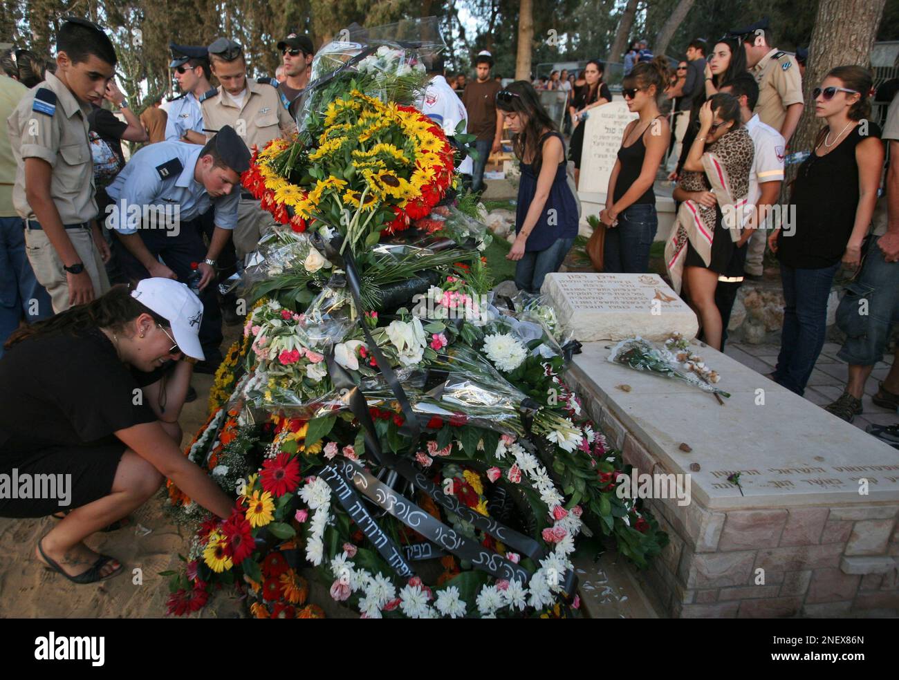 Friends and relatives of Capt. Assaf Ramon, killed in an air crash ...