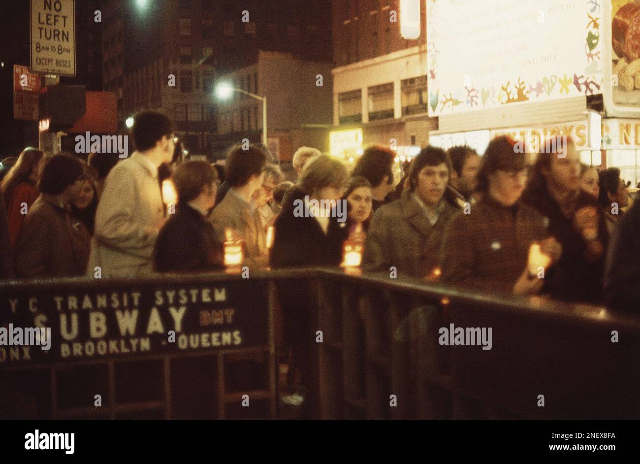 Demonstrators hold a candle light procession in Times Square in New ...