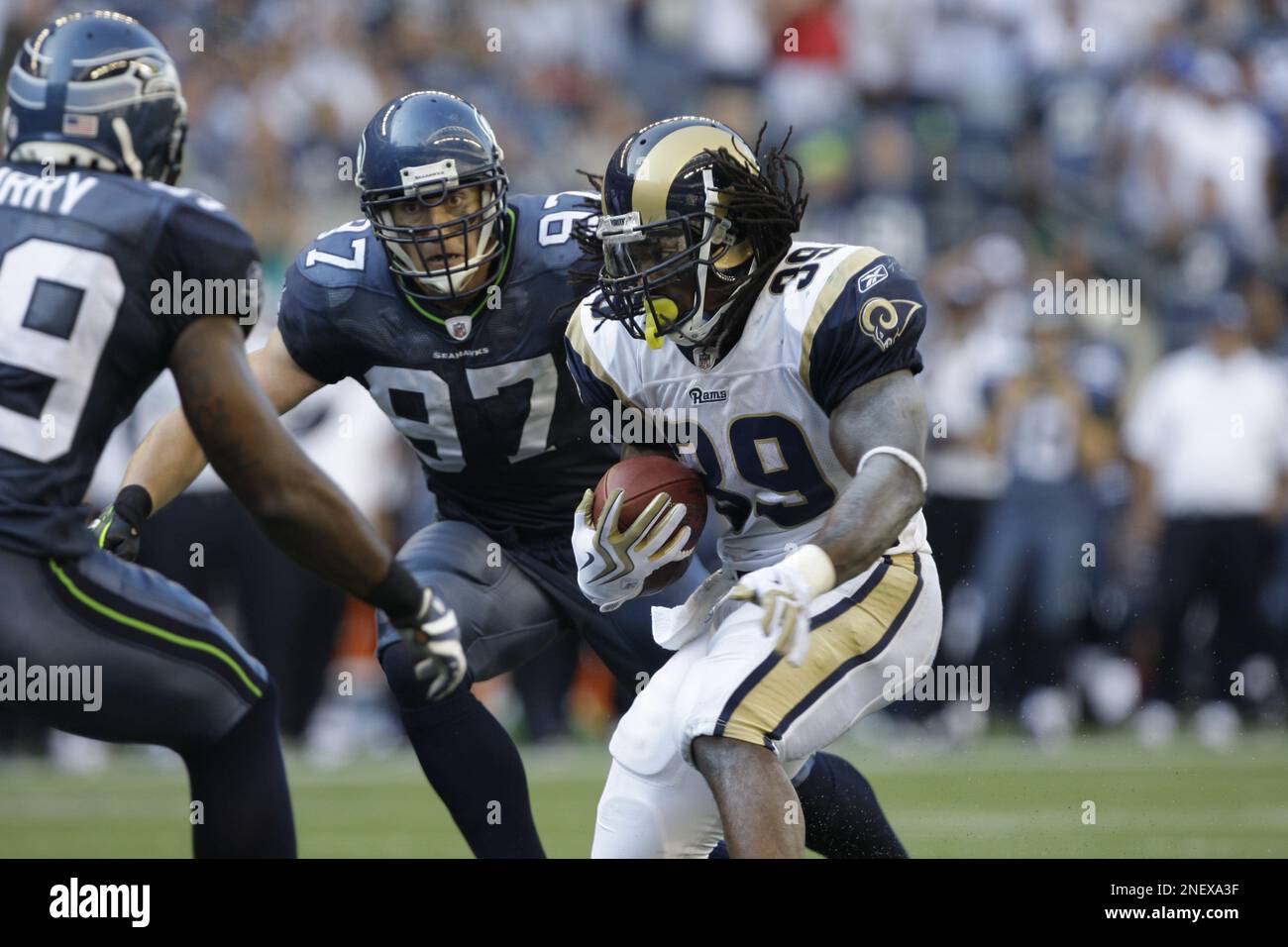 Seattle Seahawks' Ben Obomanu (87) moves in on St. Louis Rams' Steven ...