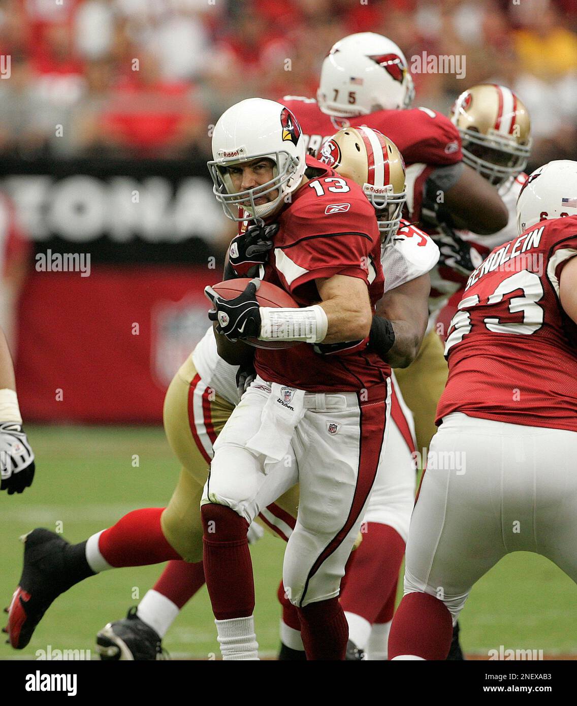 Arizona Cardinals quarterback Kurt Warner scramblesduring the first ...