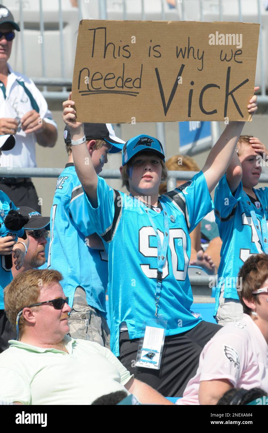 A Carolina Panthers fan is shown during an NFL football game in ...