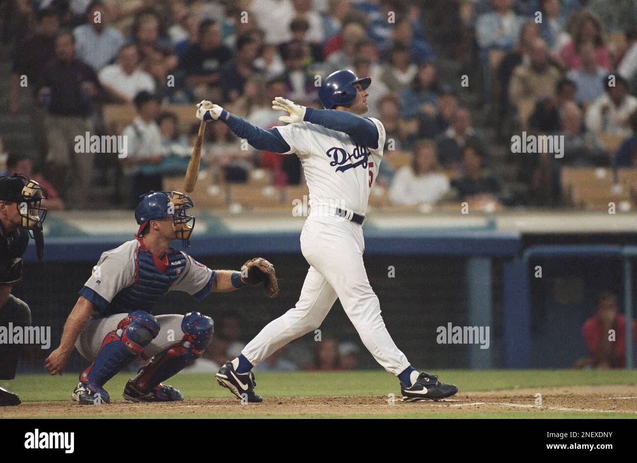 Los Angeles Dodger Dave Hansen and Chicago Cub Scott Servais follow ...