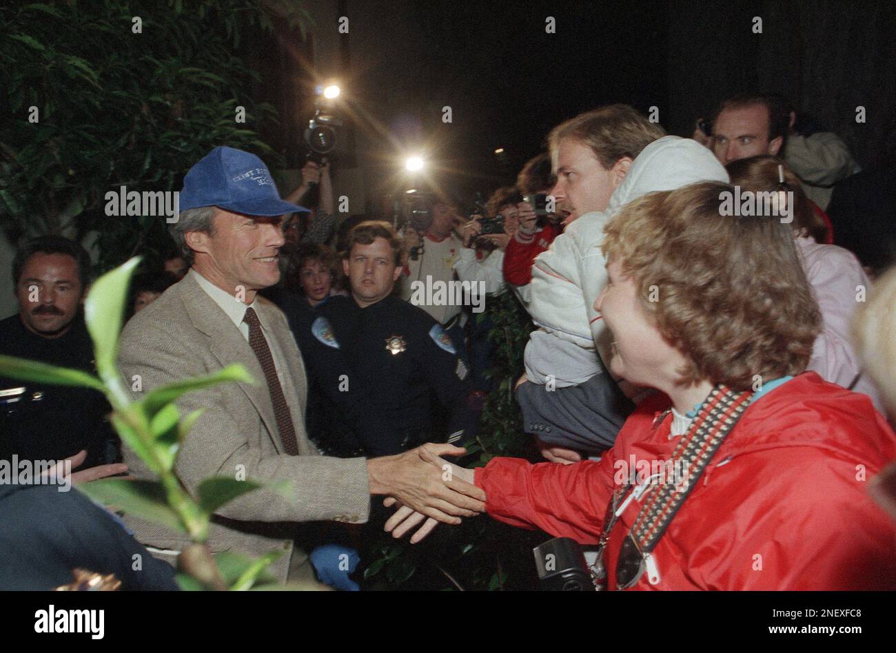 Actor Clint Eastwood shakes hands with supporters winning the election ...