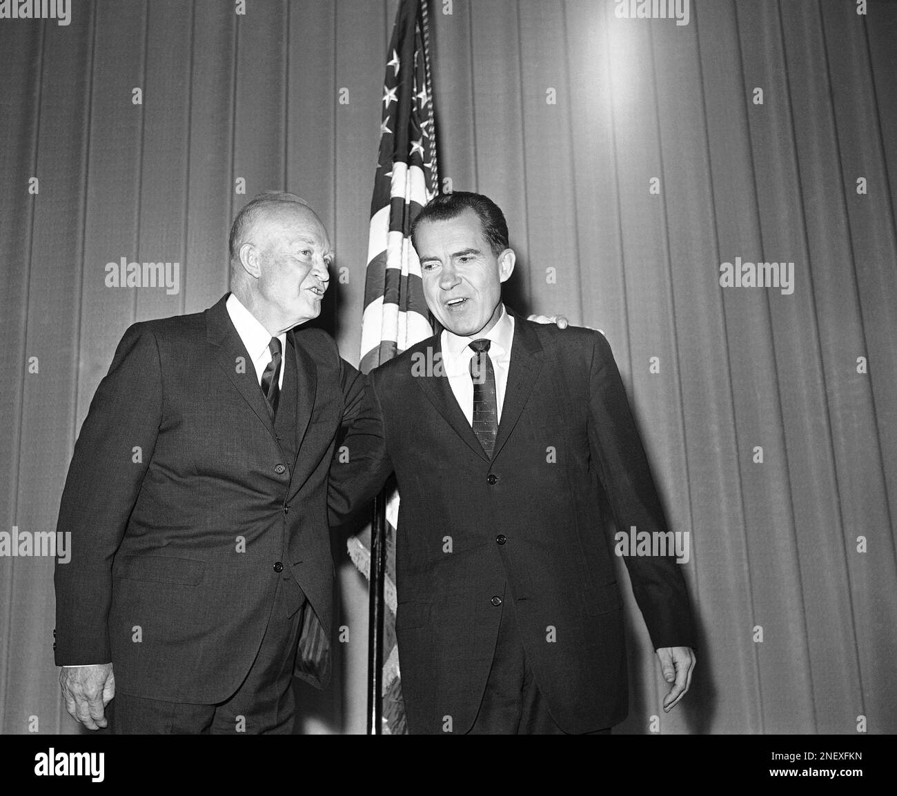 President Dwight Eisenhower and Vice President Richard Nixon wrap arms ...