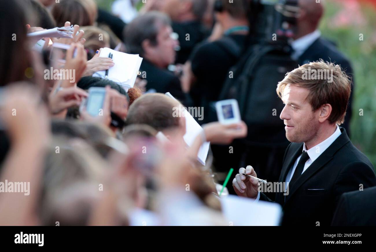 U.S. actor Ewan McGregor greets fans as he arrives for the screening of ...