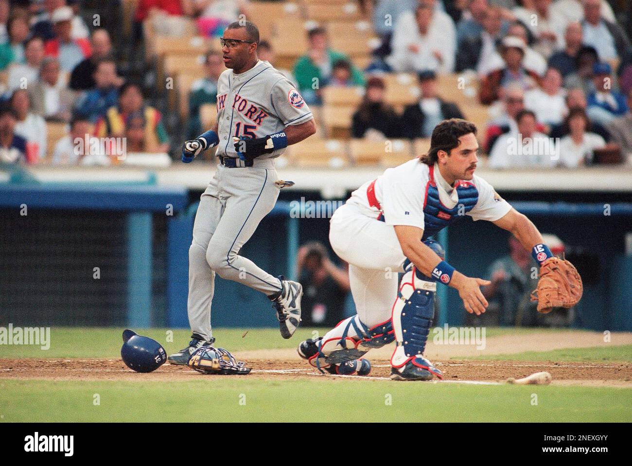 Jose Vizcaino of the New York Mets scores on a hit by Rico Brogna as ...