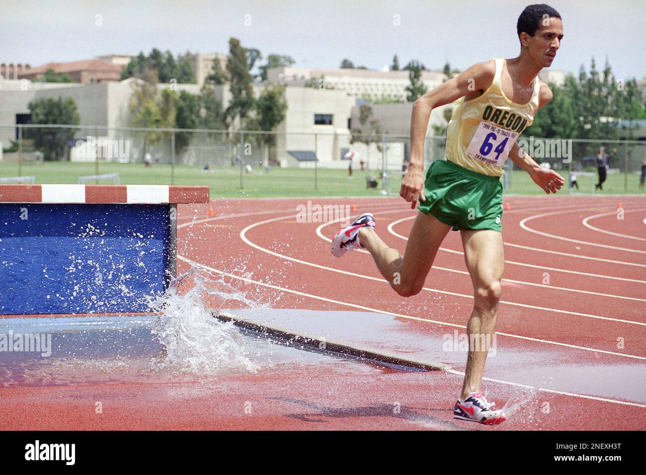 Daniel Das Neves of Oregon clears a water obstacle during his victory ...