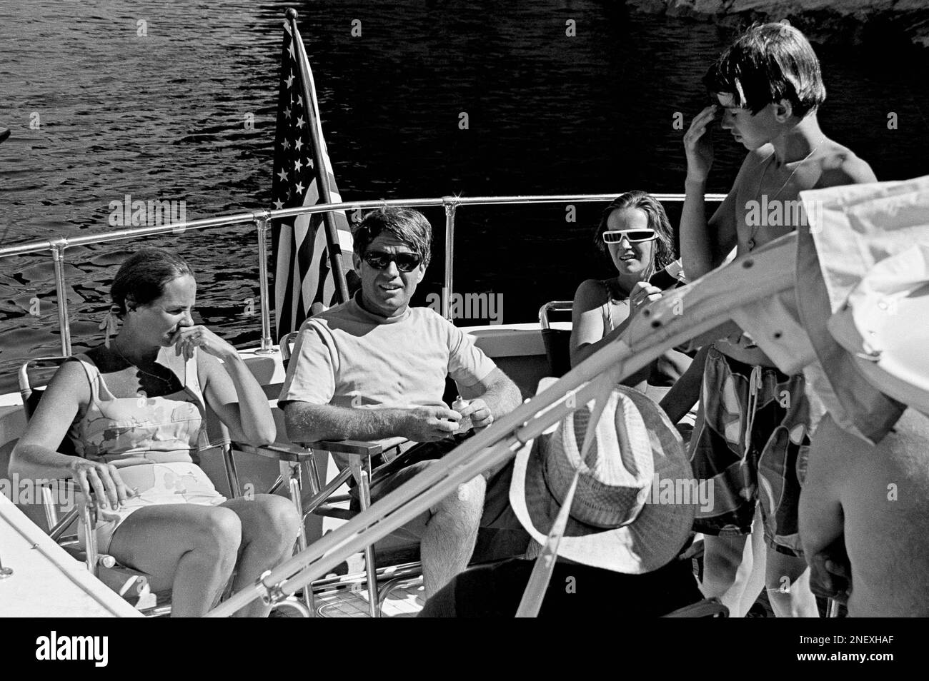 The Kennedy’s rest on deck of National Park boat during visit to Lake ...