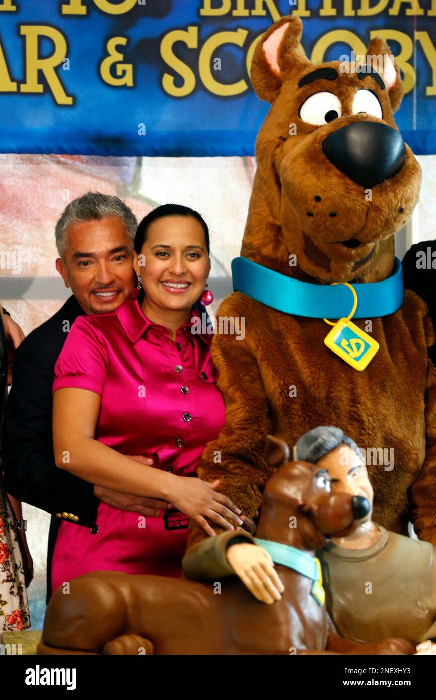 Host of the television series 'Dog Whisperer' Cesar Millan with his ...