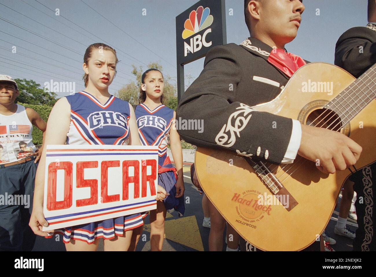 Garfield High School cheerleader Maria Vizcaino holds a sign for World ...