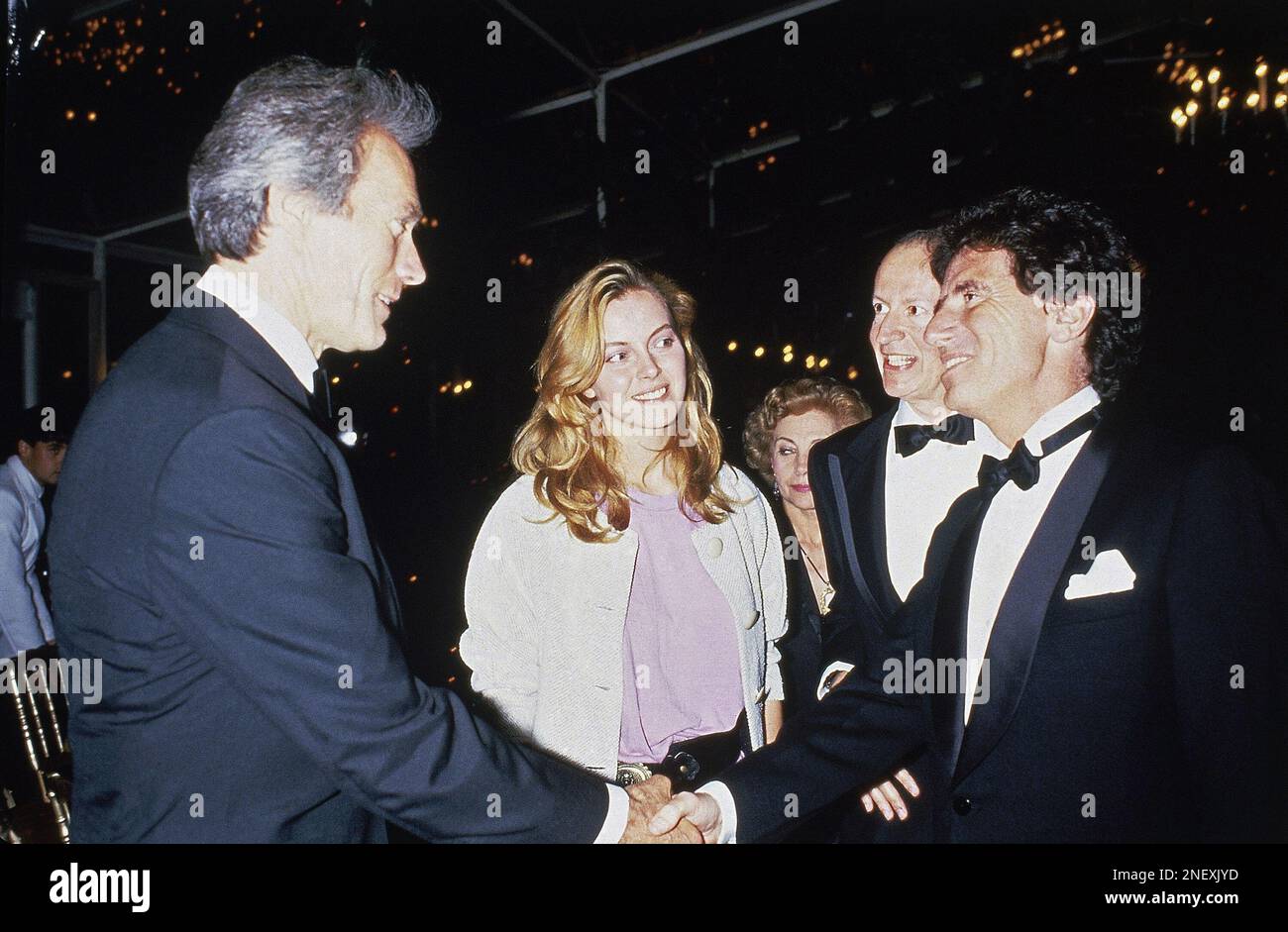 Clint Eastwood shaking hands with French Minister of Culture Jack Lang ...