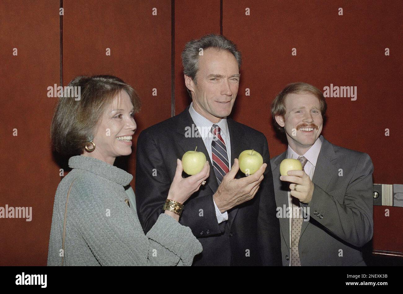 Clint Eastwood, center, lauded, Sunday, Dec. 8, 1985 in Hollywood as ...