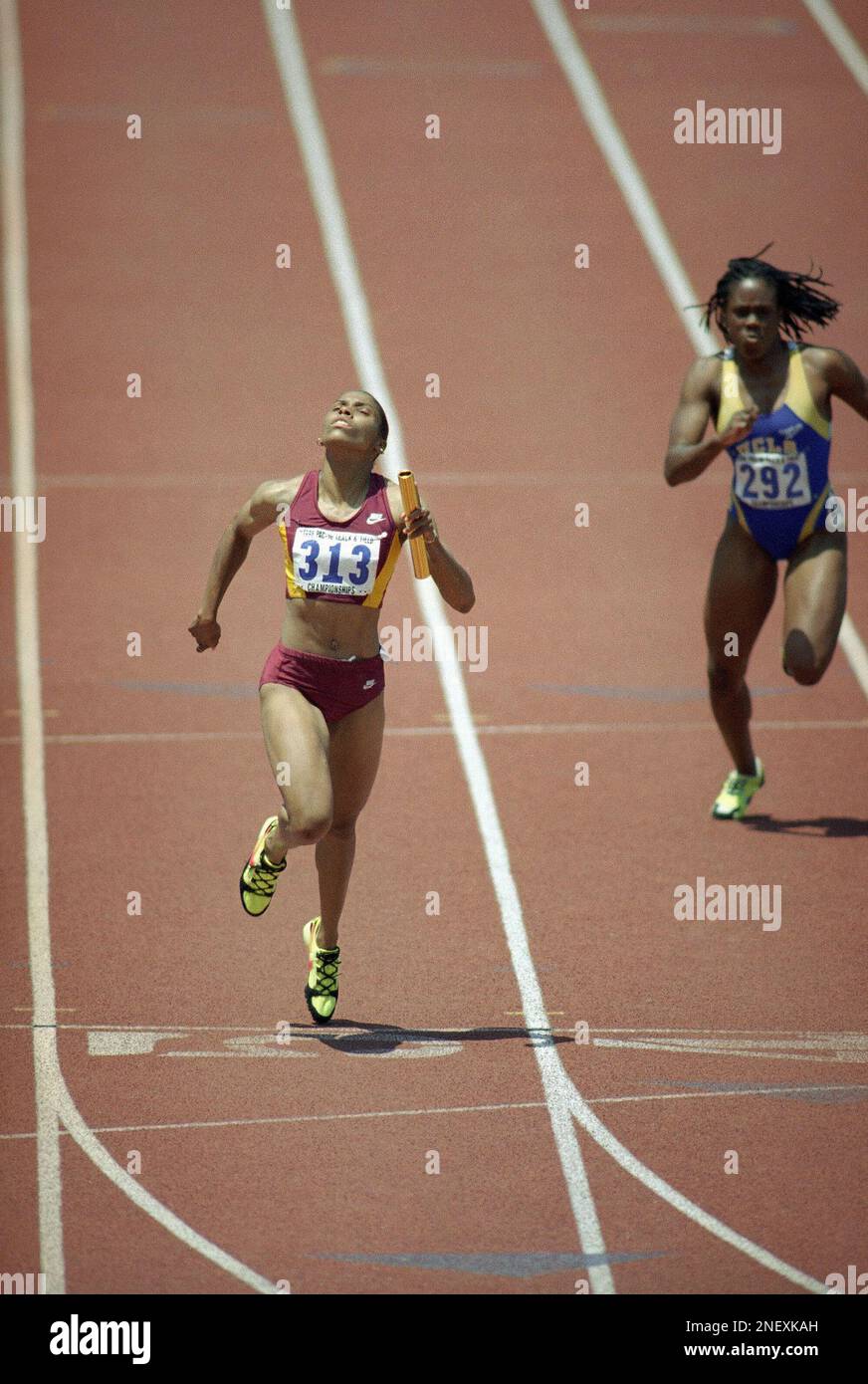 Tori Edwards of Southern Cal anchors to win the 4x100 meter relay on ...