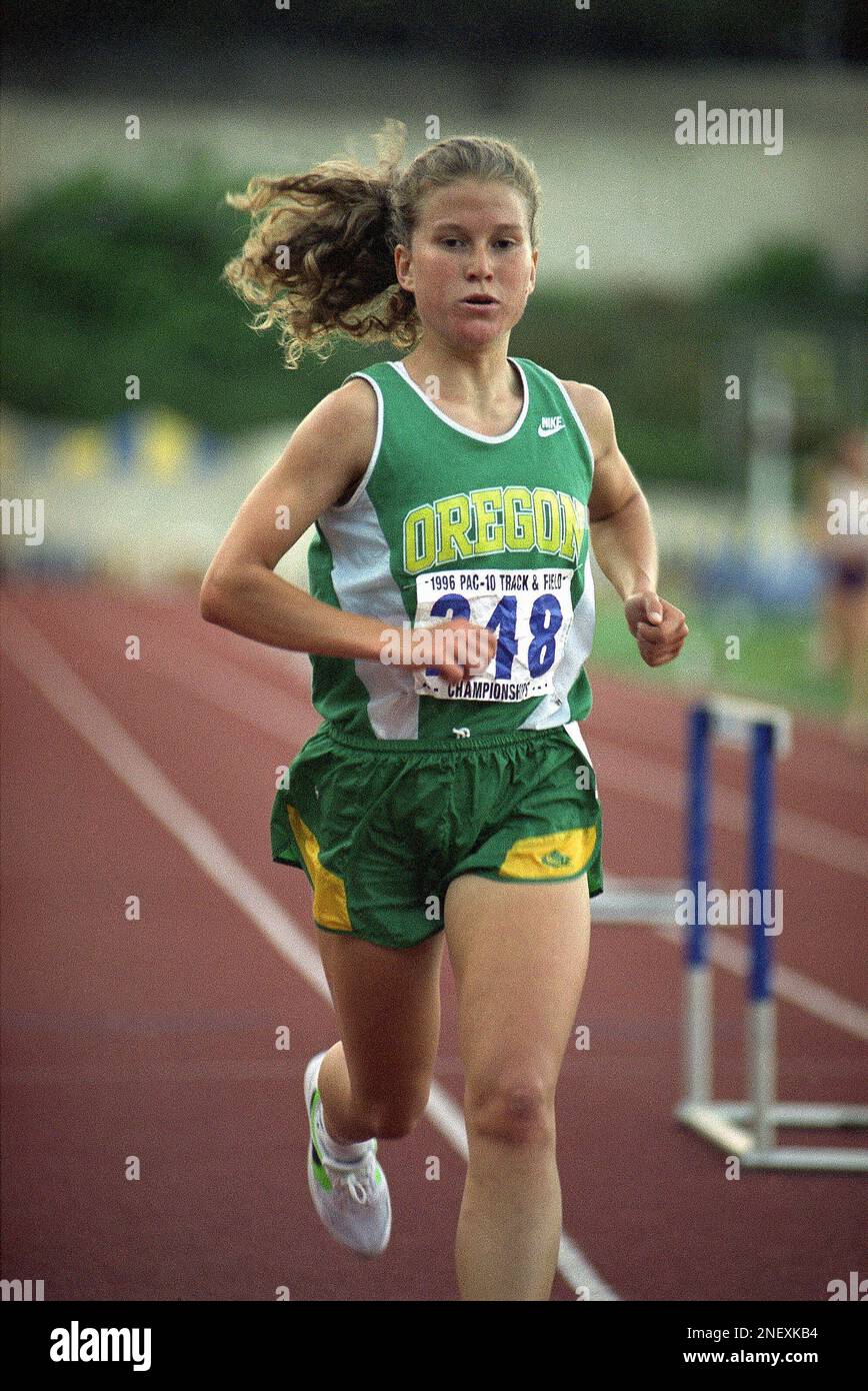 Oregon’s Melody Fairchild crosses the finish line to win the women’s ...