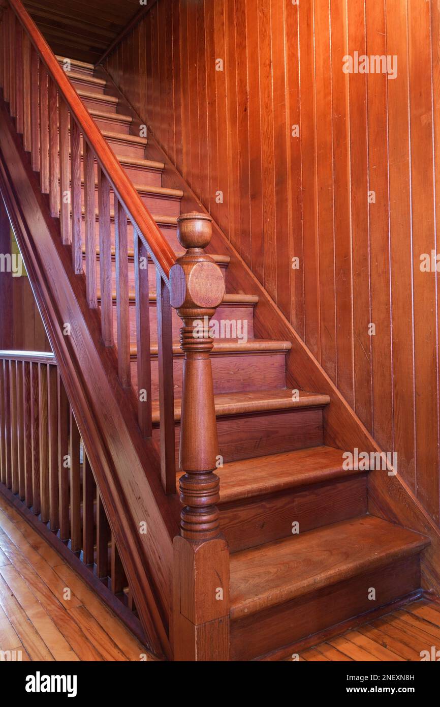 Wooden staircase leading to attic on upstairs floor with Colombian ...
