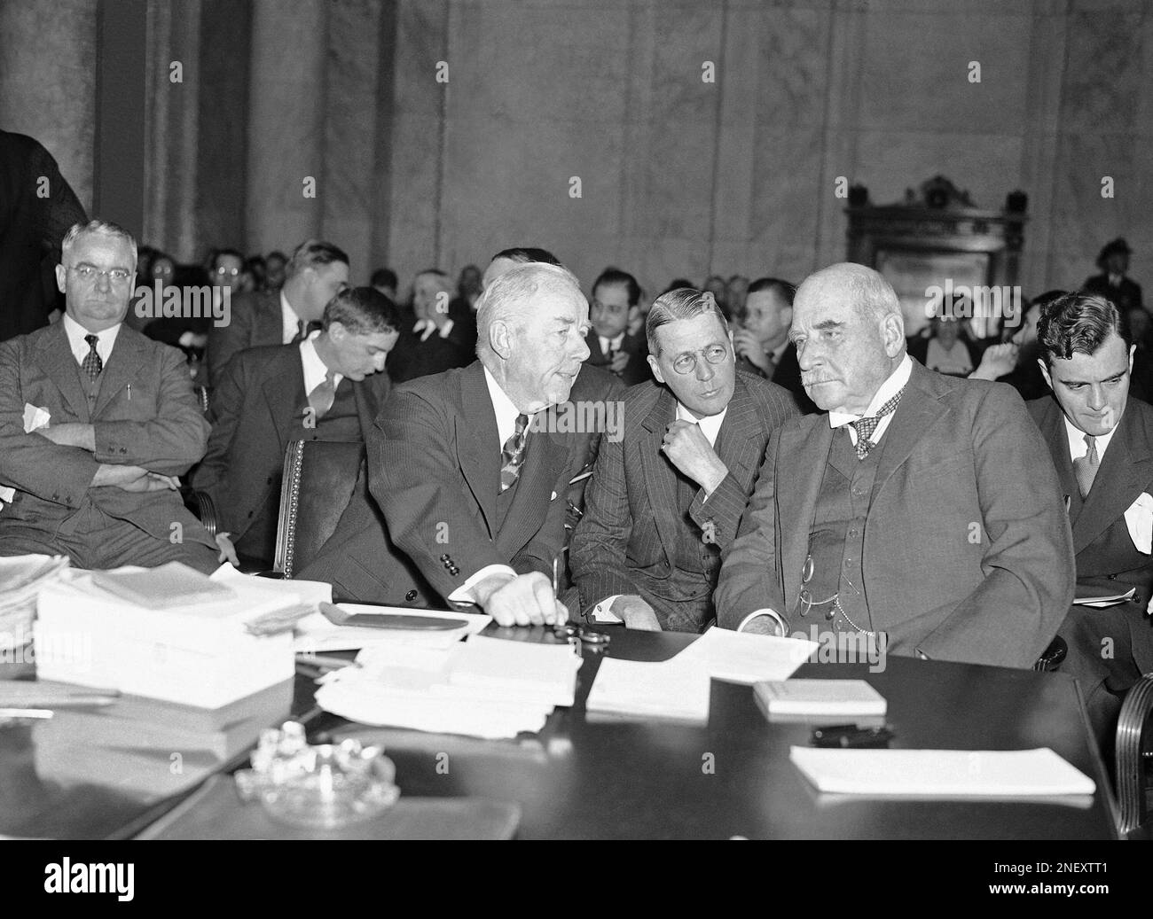 Thomas W. Lamont, left, George Whitney and J.P. Morgan, right, shown in ...