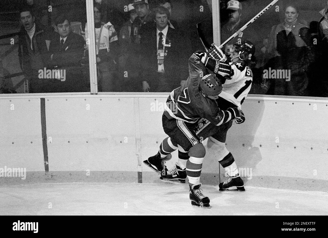 Norway’s defense man Rune Molberg, left, and US player Eric Strobel are ...