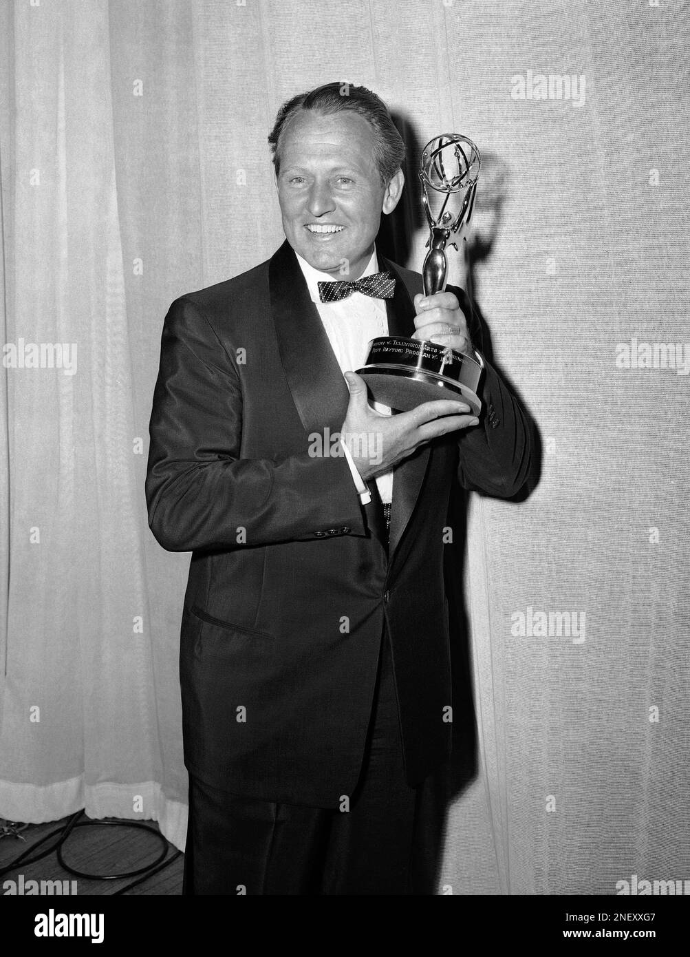 Art Linkletter poses with the Emmy awarded to him by the Television ...