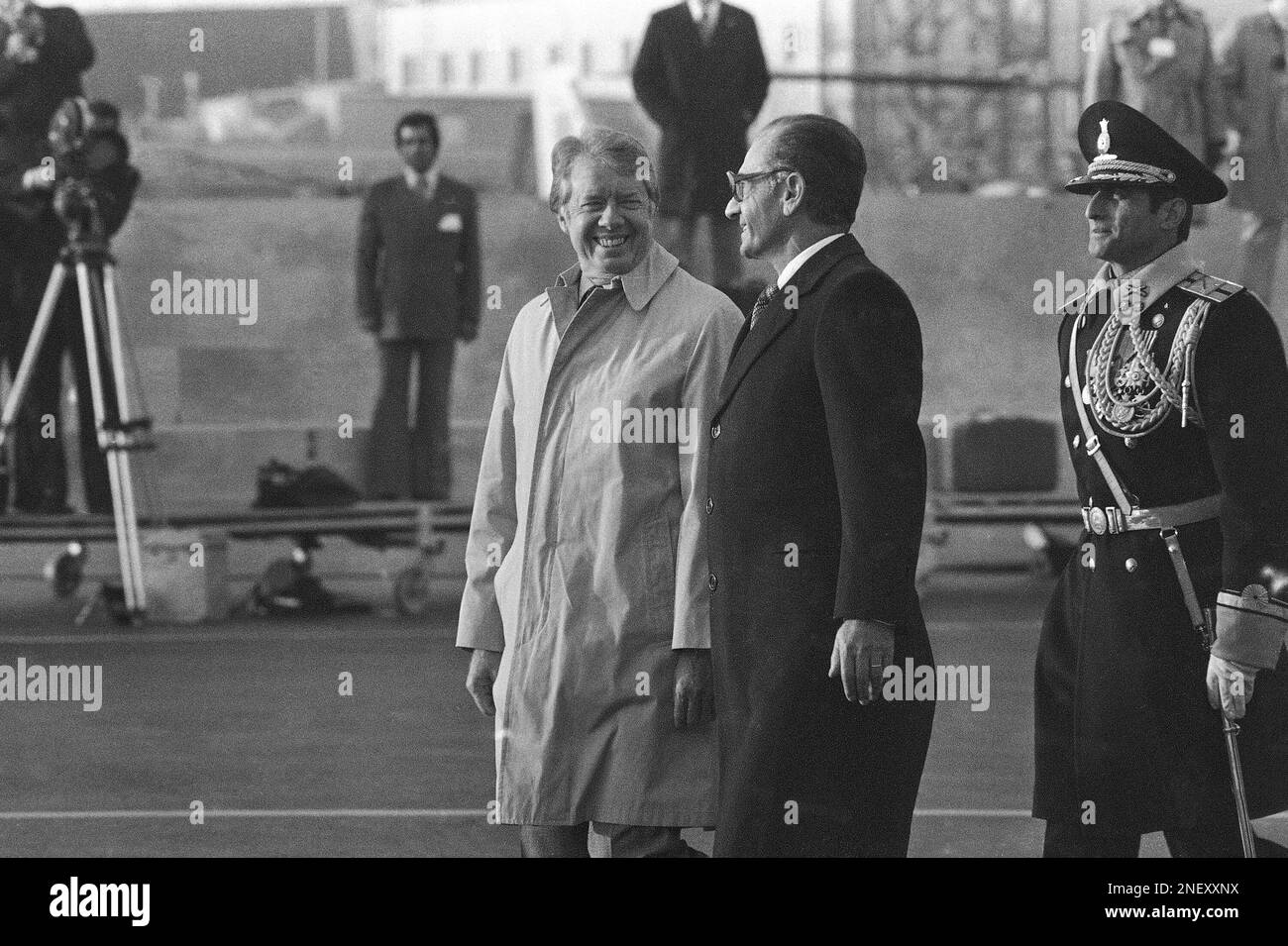 President Jimmy Carter and the Shah of Iran receive salutes after ...