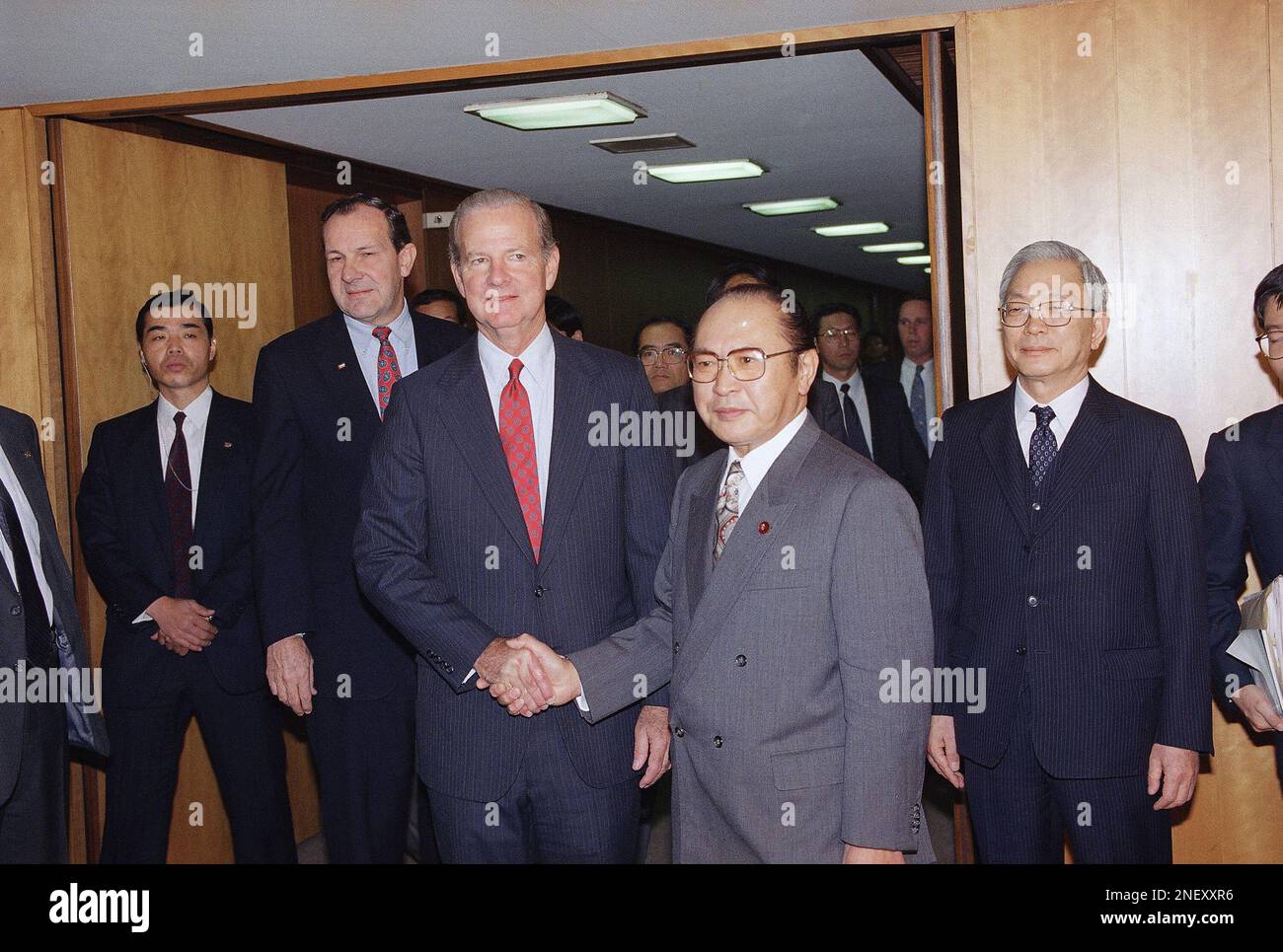 U.S. Secretary of State James Baker III is welcomed by his Japanese ...