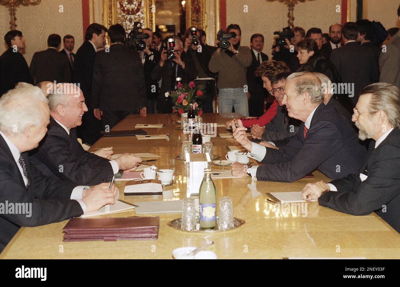 Soviet President Mikhail Gorbachev, left, smiles as he sits across the ...