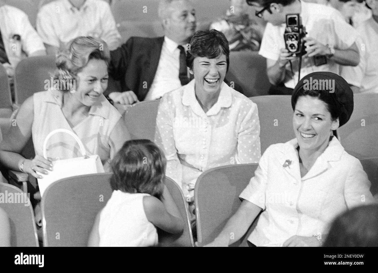 The wives of the Apollo 11 astronauts are a happy trio as they wait for ...