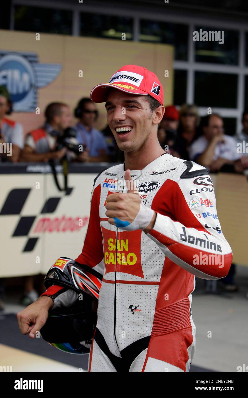 Alex De Angelis, of San Marino, celebrates after finishing second in ...