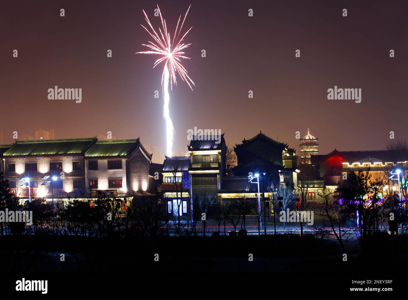 Fireworks up ancient buildings at night, in China Stock Photo - Alamy