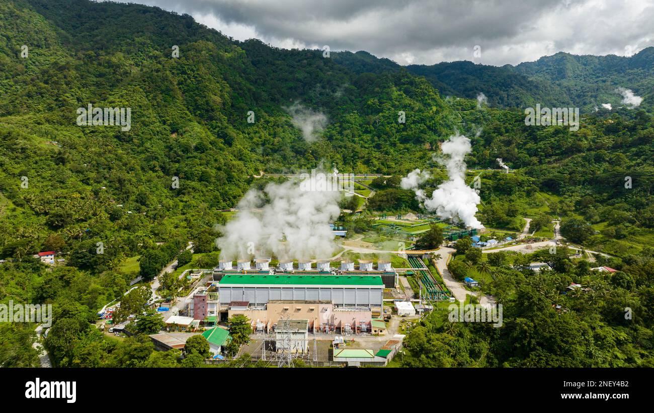 Aerial view of geotermal power plant in the mountains. Geothermal ...