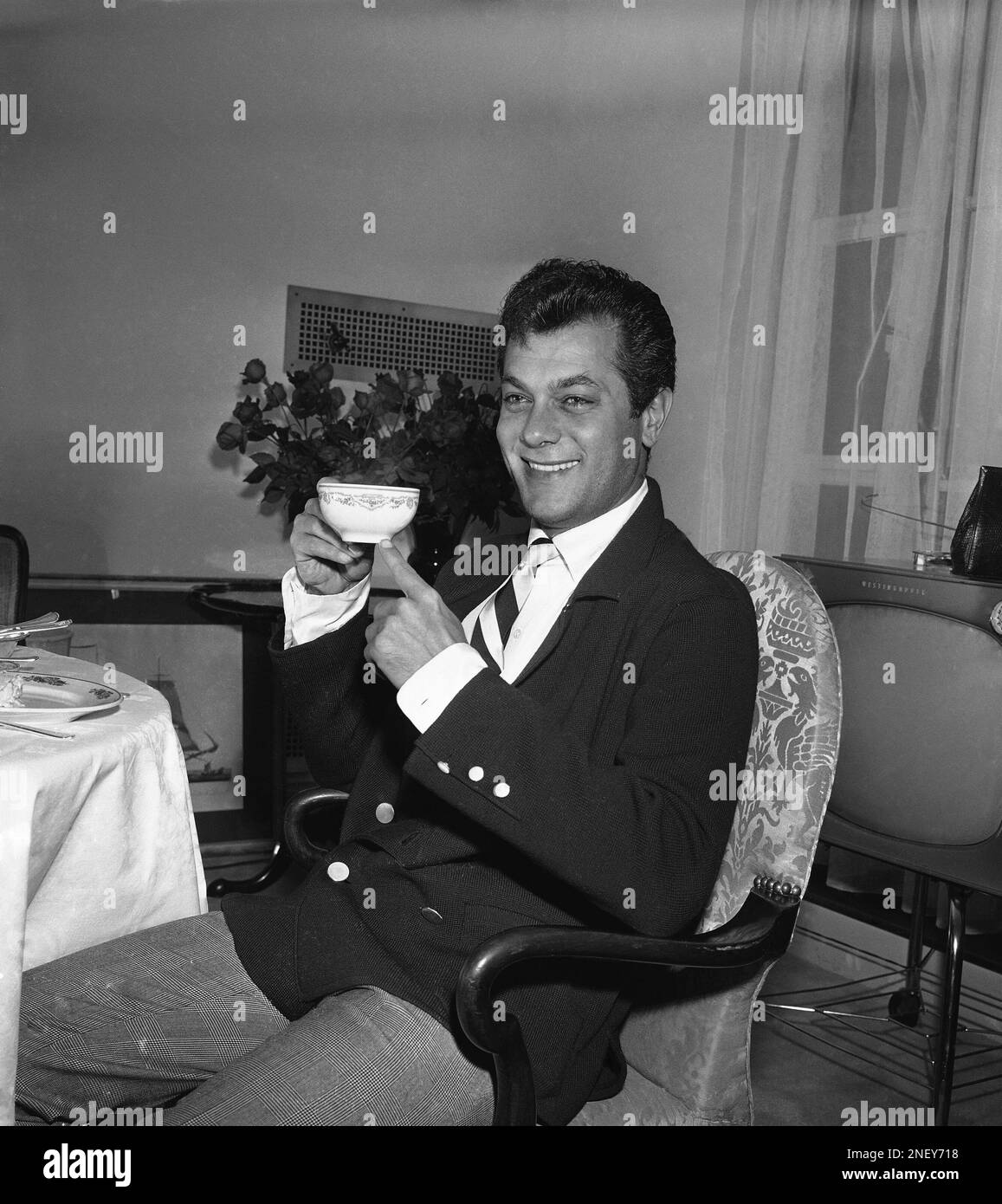 Tony Curtis is shown in his room at the Sherry Netherland, Oct. 6, 1958 ...