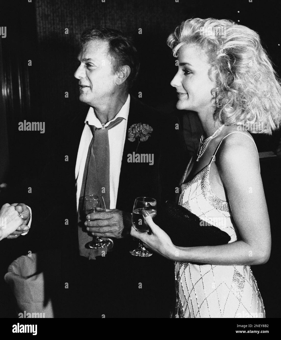 Actor Tony Curtis and his new bride, 21-year-old Andria Savio, attend a ...