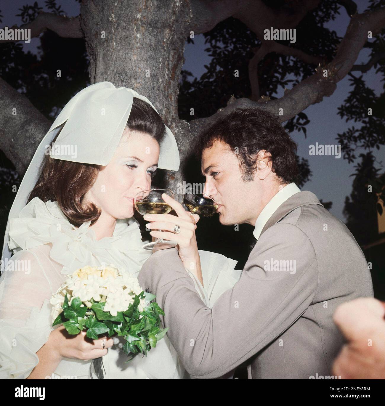 Tony Curtis and his bride, model Leslie Allen, pose at the Curtis home ...