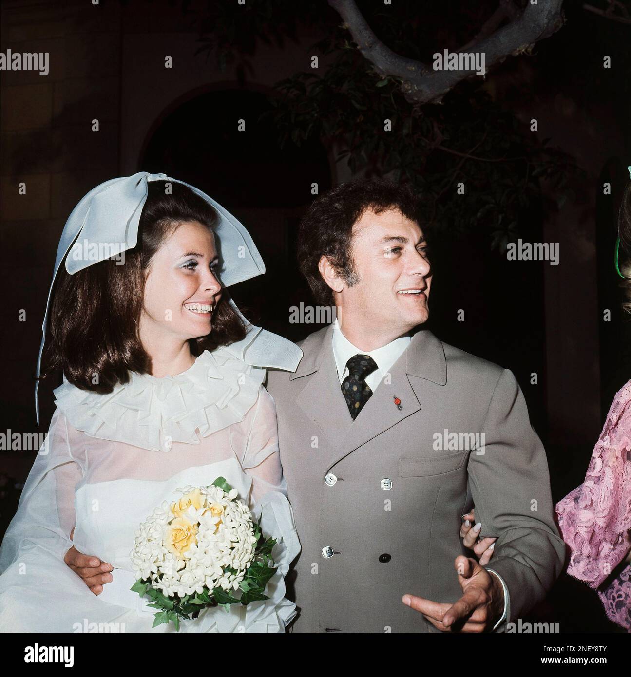 Tony Curtis and his bride, model Leslie Allen, pose at the Curtis home ...