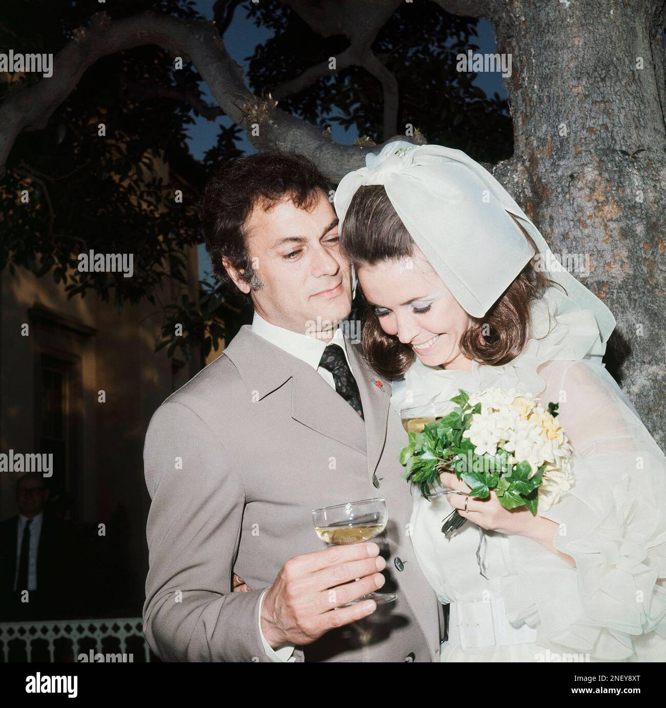 Tony Curtis and his bride, model Leslie Allen, pose at the Curtis home ...