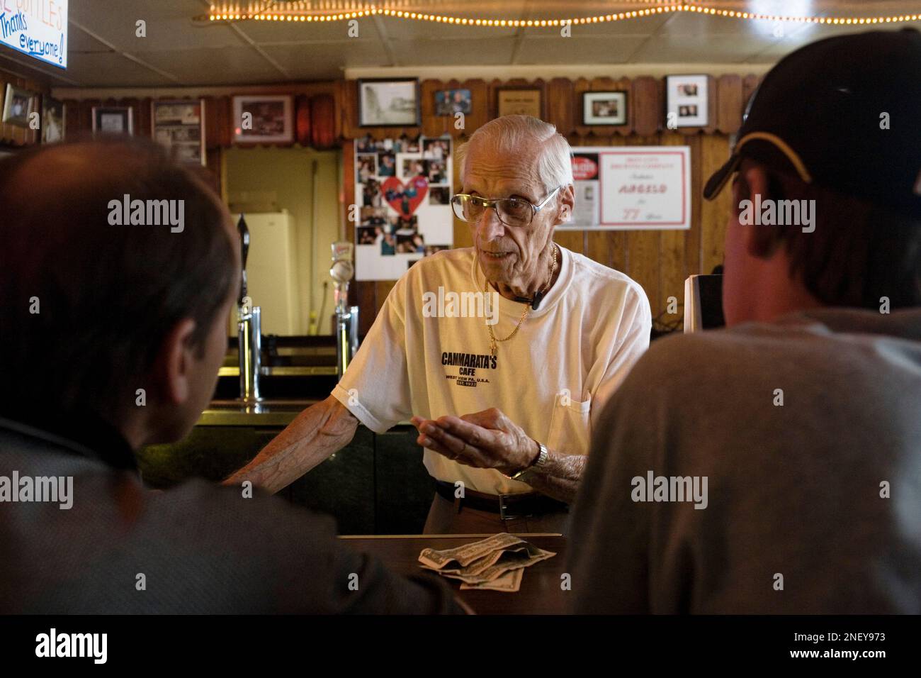 **HOLD FOR STORY BY DAN NEPHIN**Angelo Cammarata talks with costumers ...
