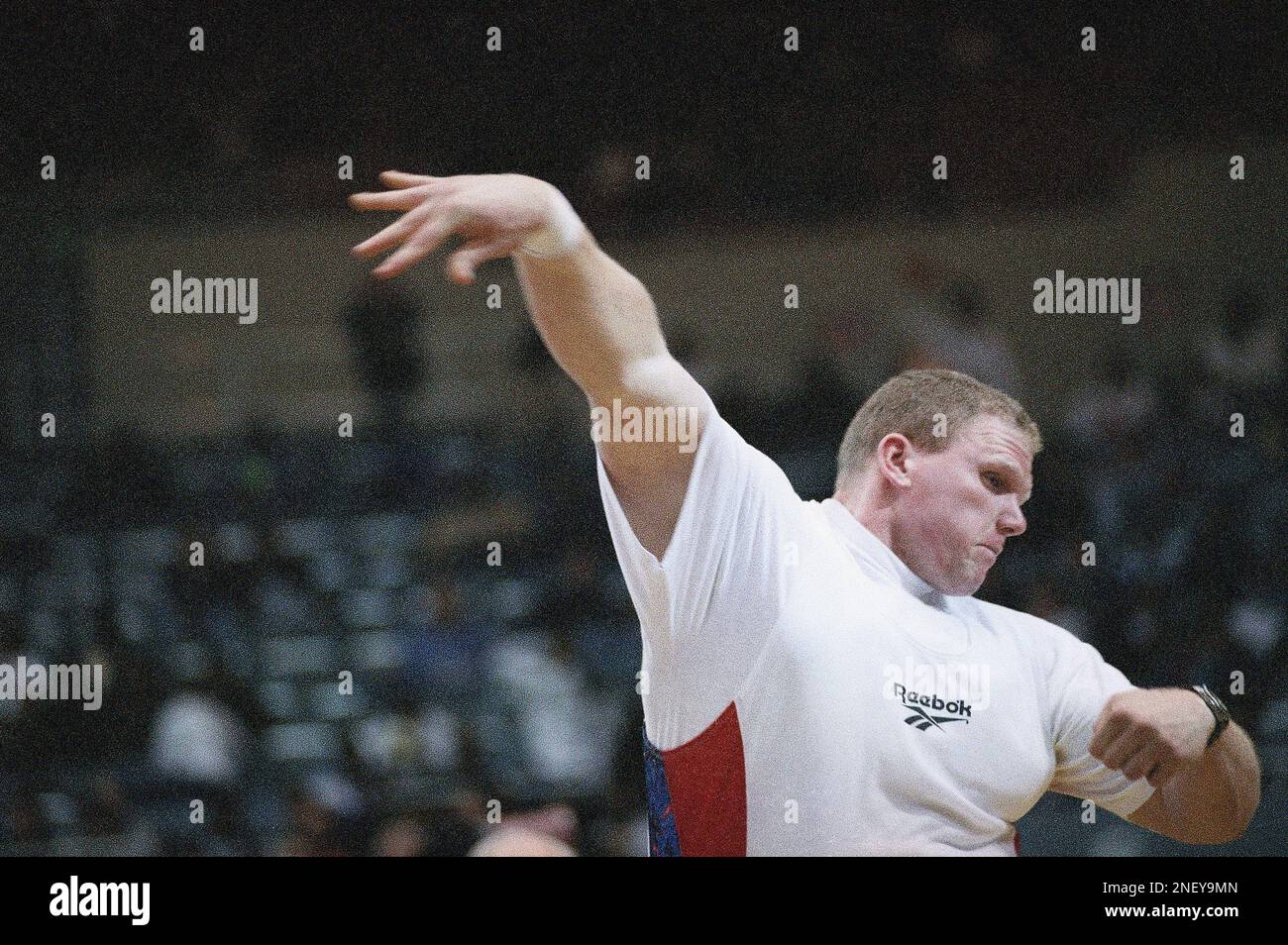 Olympic hopeful John Godina, of Los Angeles, shows his winning form ...