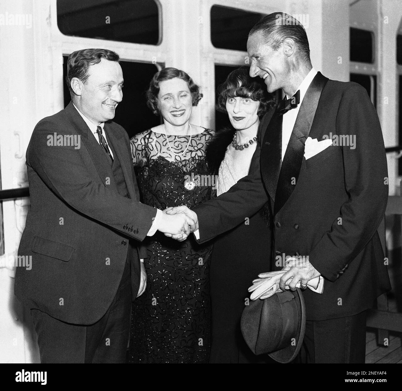 Gov. George H. Earle of Pennsylvania is shown shaking hands with ...