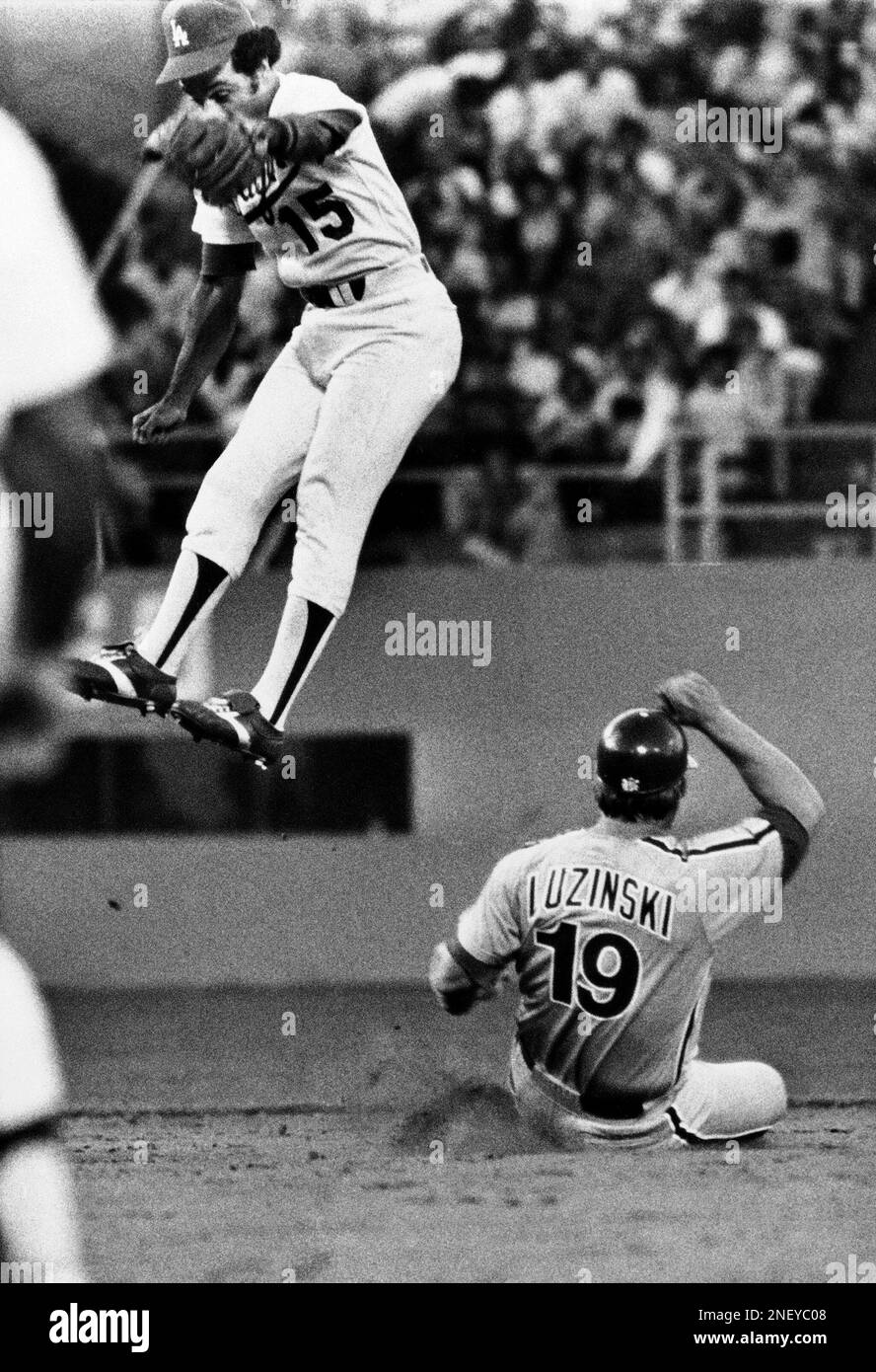 Philadelphia Phillies Greg Luzinski slides safely into second base as ...