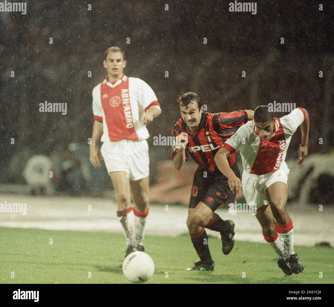Ajax defender Michael Reiziger, right, and AC Milan’s striker Dejan ...