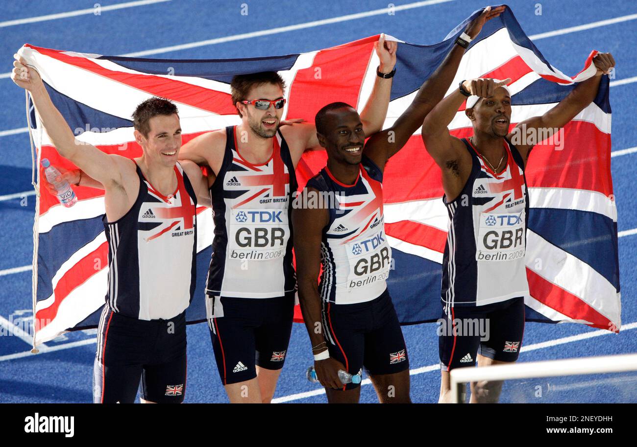 Britain's team celebrates taking the silver medal in the final of the ...
